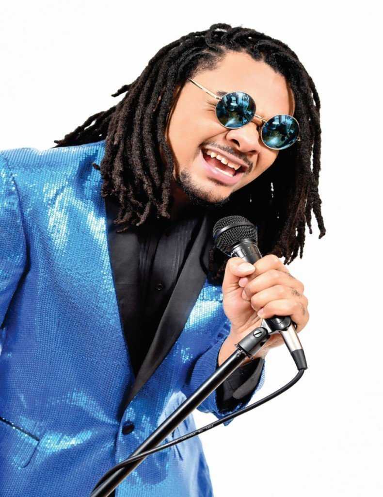 Ricky Persaud Jr. strumming sounds of Love, Peace and Unity | Toronto ...