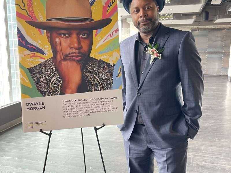 Award-winning spoken word artist Dwayne Morgan receives the celebration ...